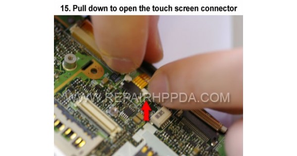 15. Pull down to open the touch screen connector